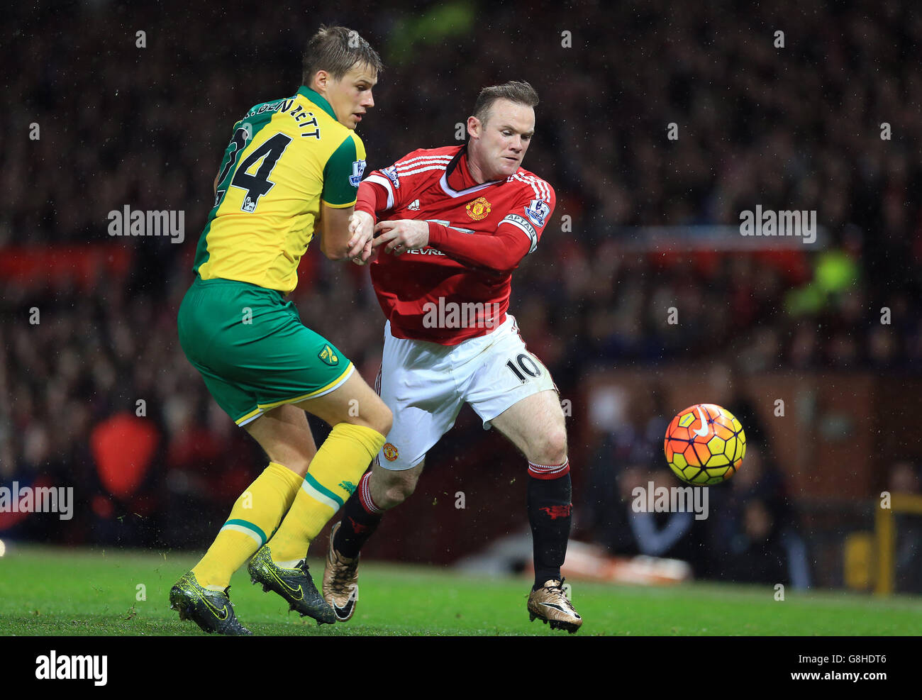 Norwich City's Ryan Bennett (left) and Manchester United's Wayne Rooney ...