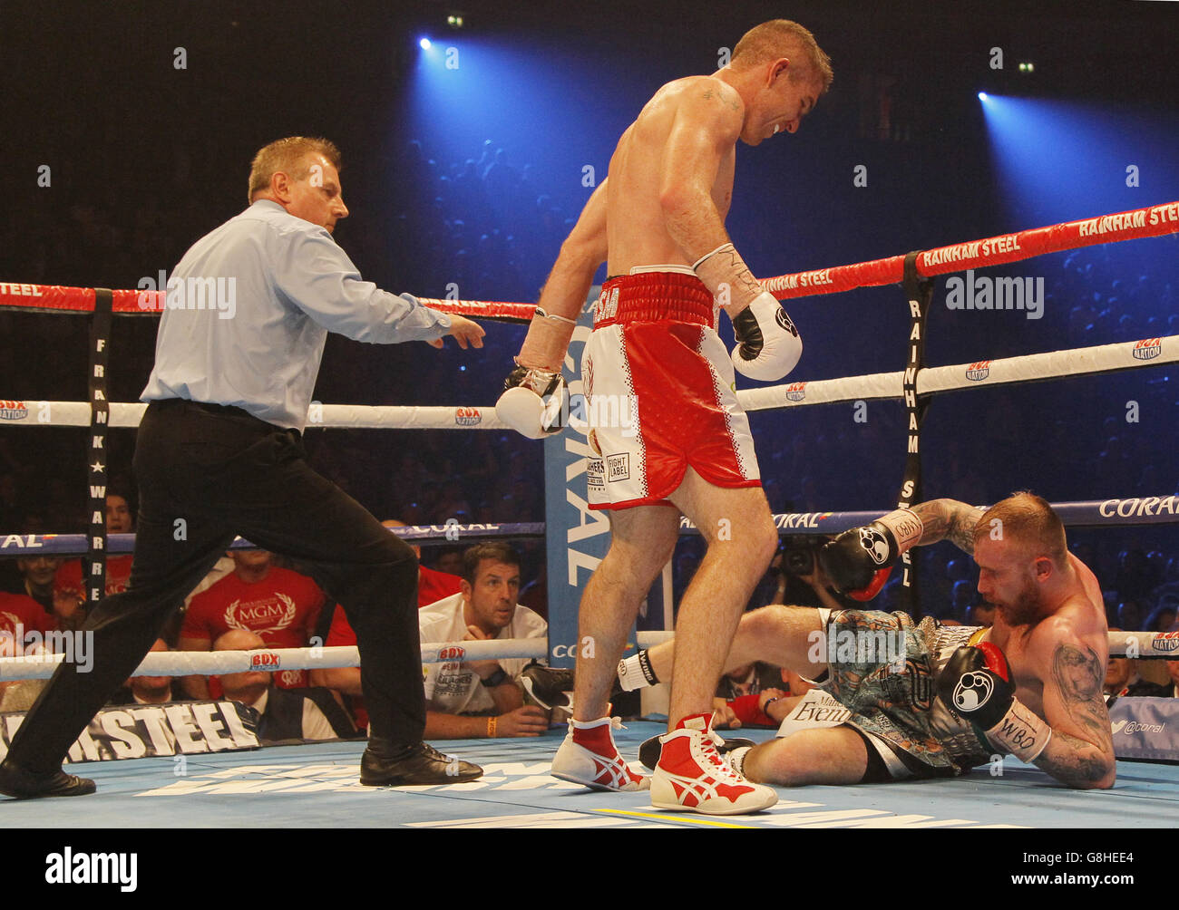 Boxing - Manchester Arena. Liam Smith knocks down Jimmy Kelly (right ...