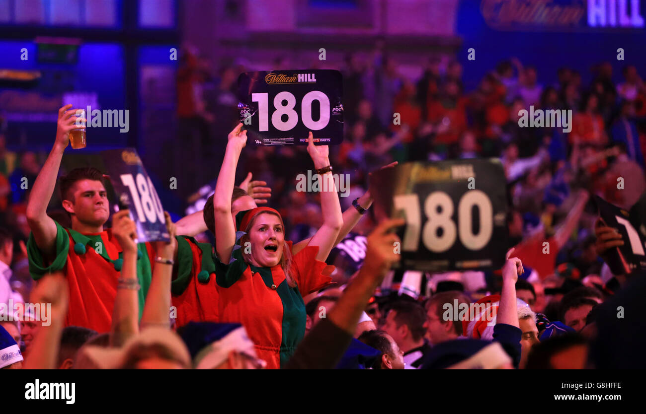 Darts fans celebrate during day six of the William Hill PDC World ...