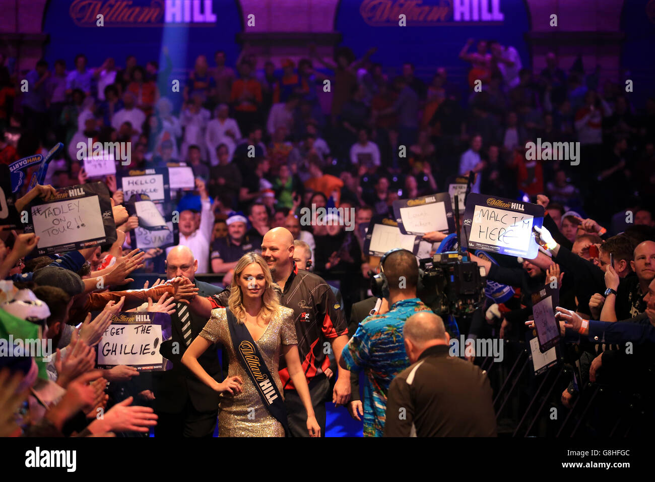Darin Young walks out before his match against Terry Jenkins during day ...