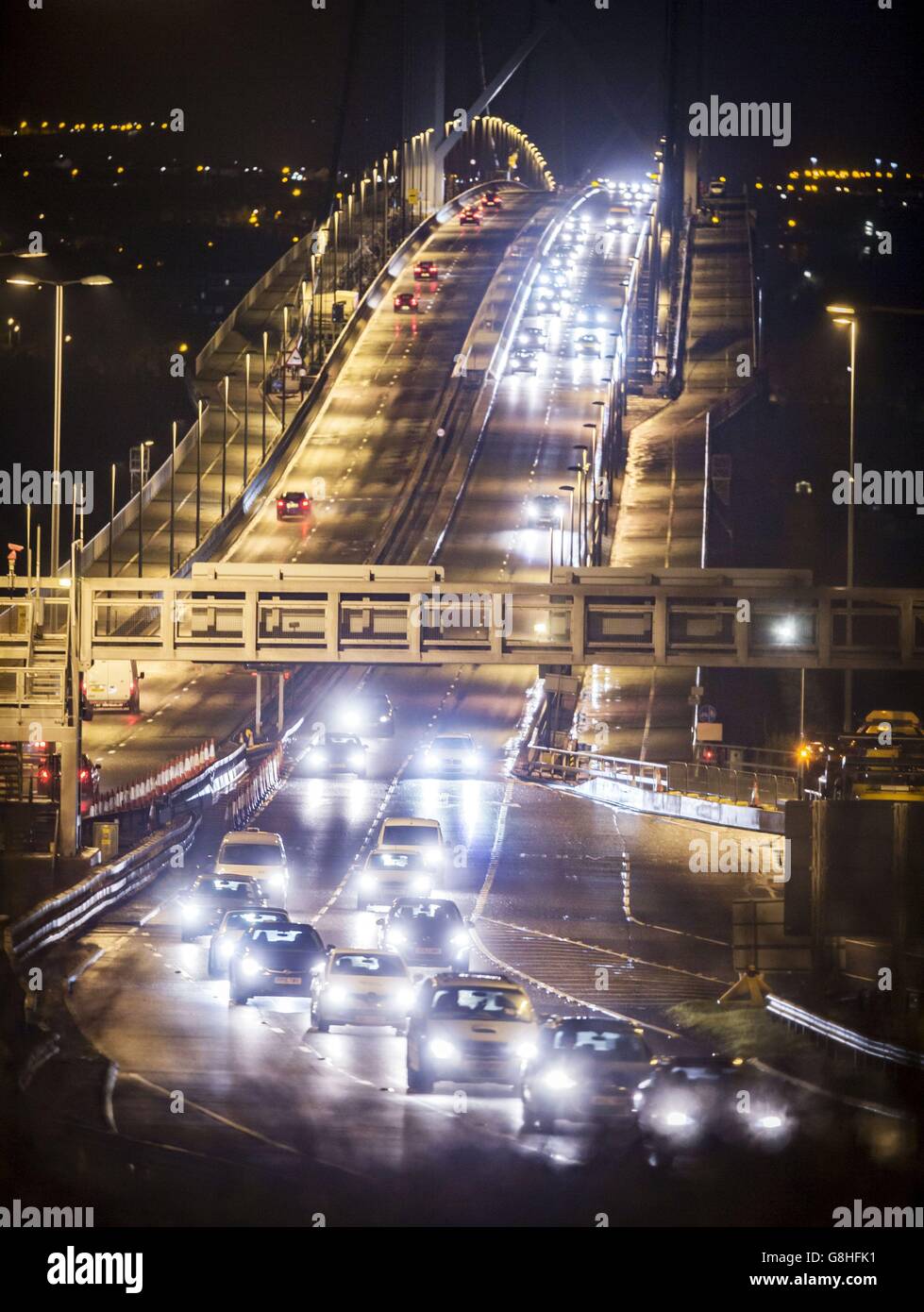 Cars drive over the Forth Road Bridge in Scotland after the bridge ...