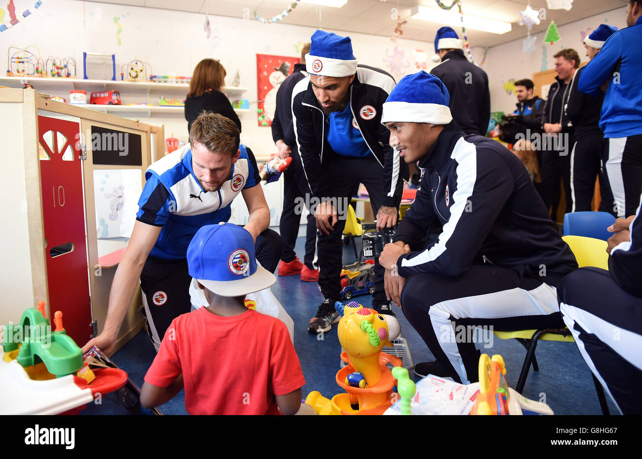 Reading's Jordan Obita (right), Chris Gunter and Danny Williams (centre ...