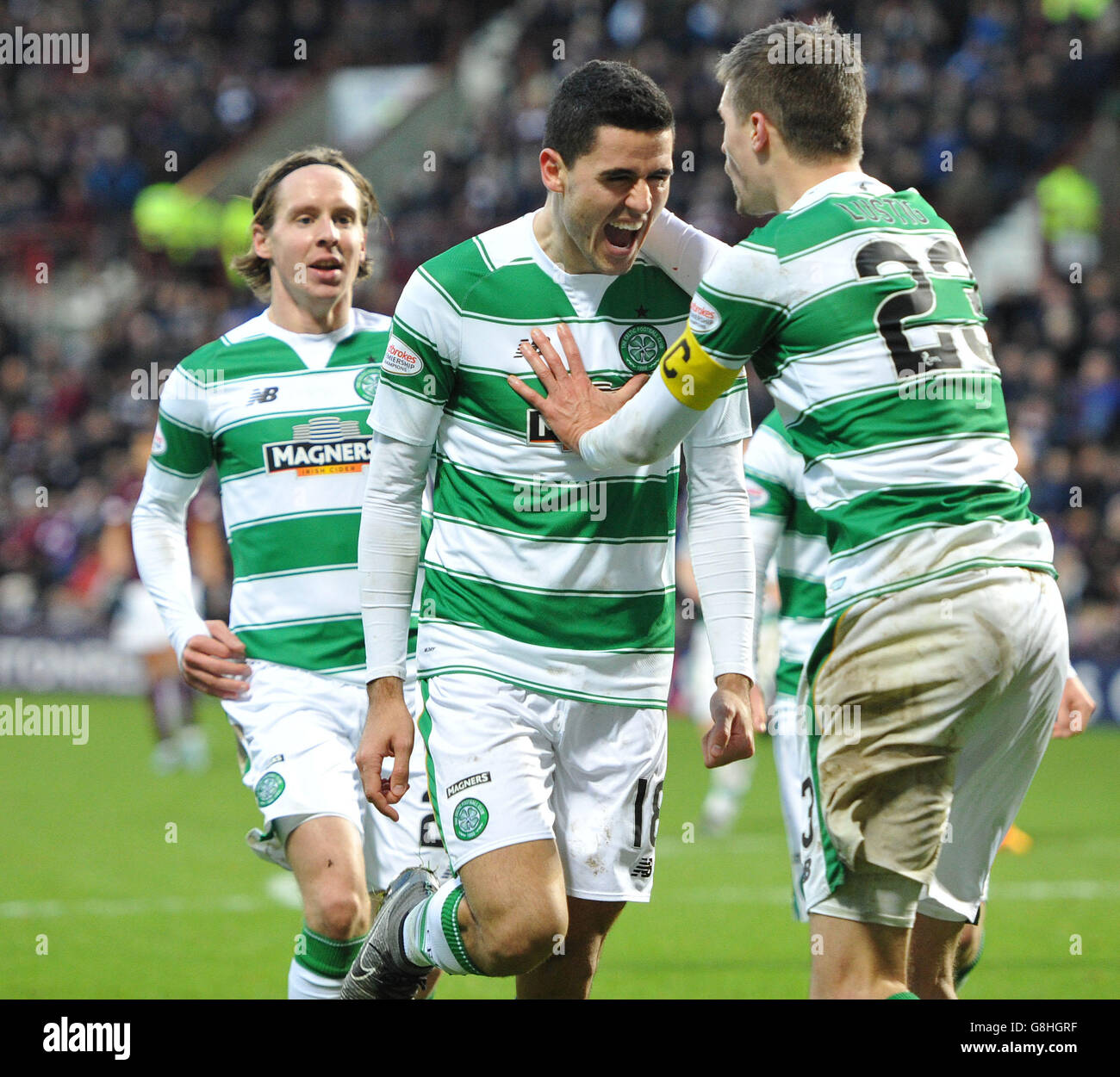 Celtic's Tomas Rogic (centre) celebrates with his team mates Mikael ...