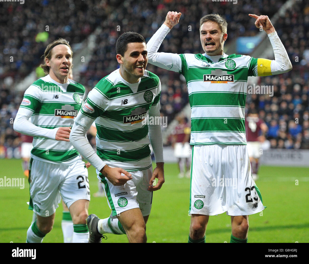 Celtic's Tomas Rogic (centre) celebrates with his team mates Mikael ...