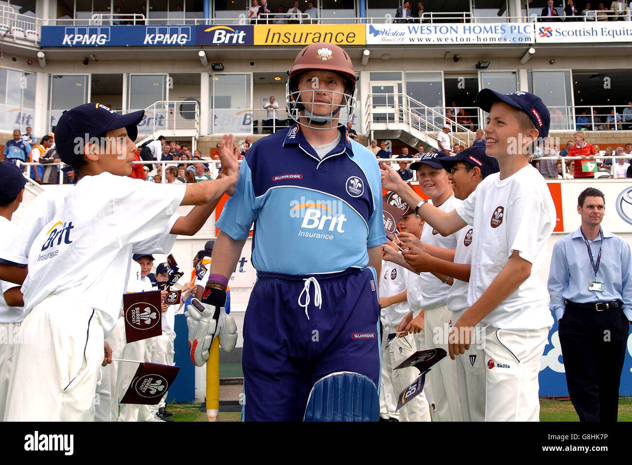 Surrey lions ali brown leads out his team hi-res stock photography and ...