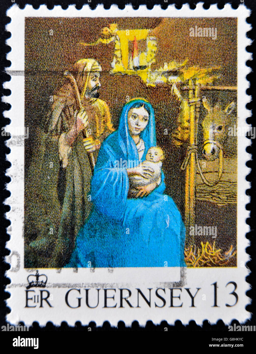GUERNSEY - CIRCA 1971: A stamp printed in Guernsey shows nativity ...