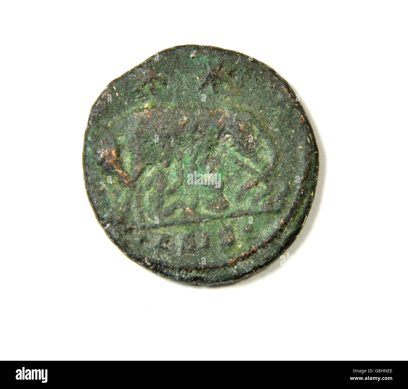 Ancient Roman coin on a white background. Capitoline wolf with Romulus ...