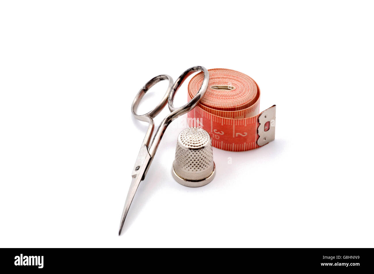 Kit consists of cutting and sewing scissors, thimble and tape measure ...