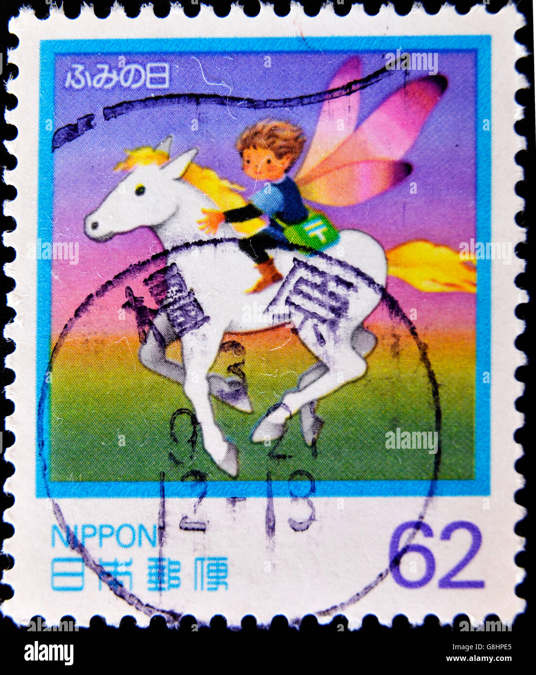 JAPAN - CIRCA 1990: A stamp printed in Japan showing a horse with a boy ...