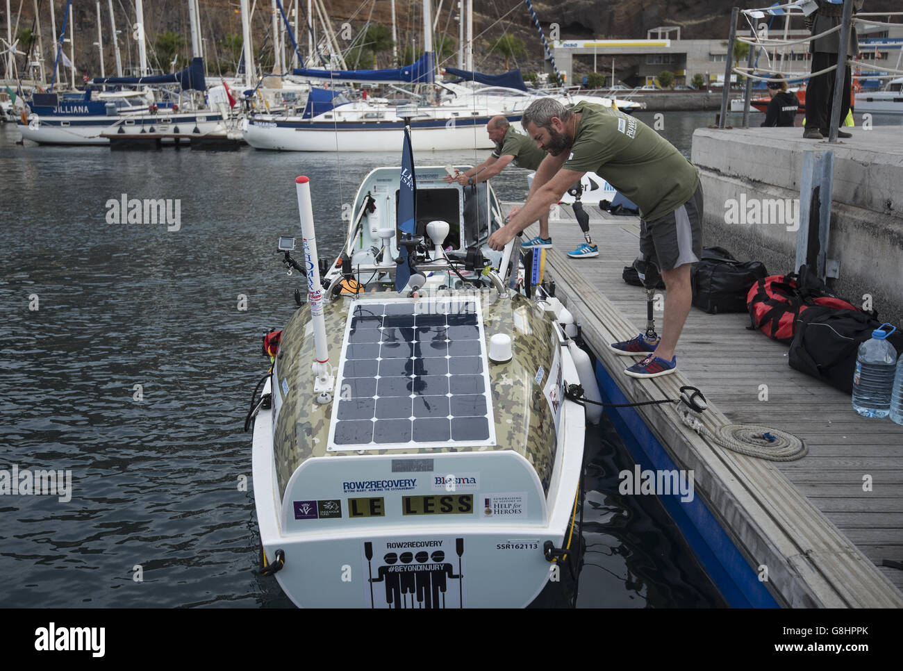 Paddy Gallagher (front) and Nigel Rogoff of Row2Recovery prepare their ...