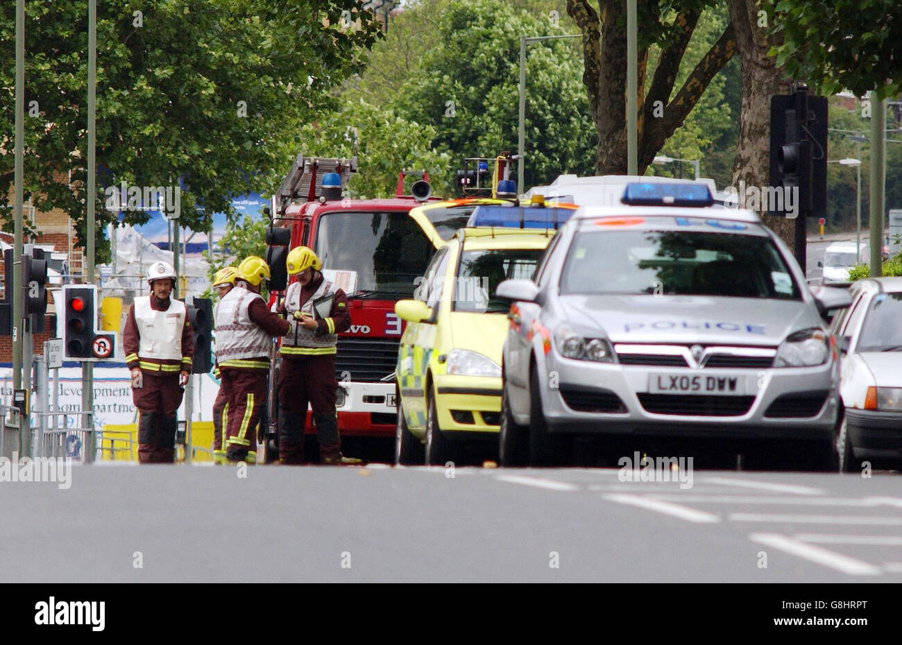 Police and emergency services cordon off an area of the High Road near ...