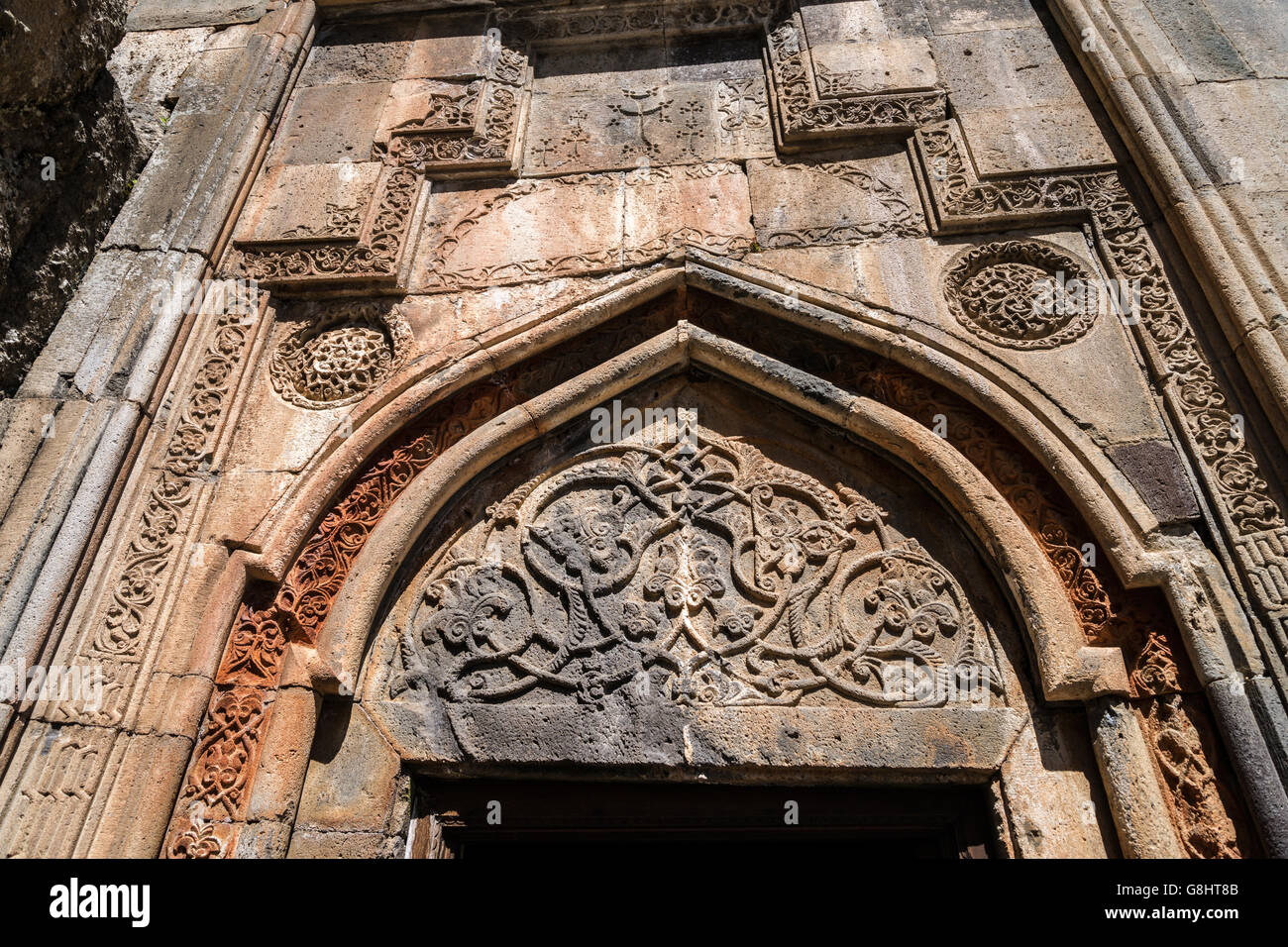 Decoration of entrance to gavit in Geghard monastery in Armenia Stock ...