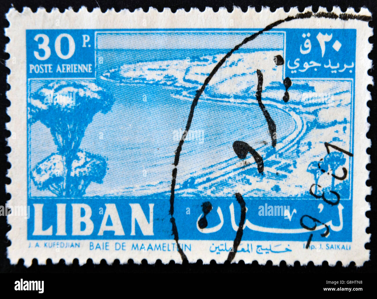 LEBANON - CIRCA 1961: A stamp printed in Lebanon shows Maameltein Bay ...