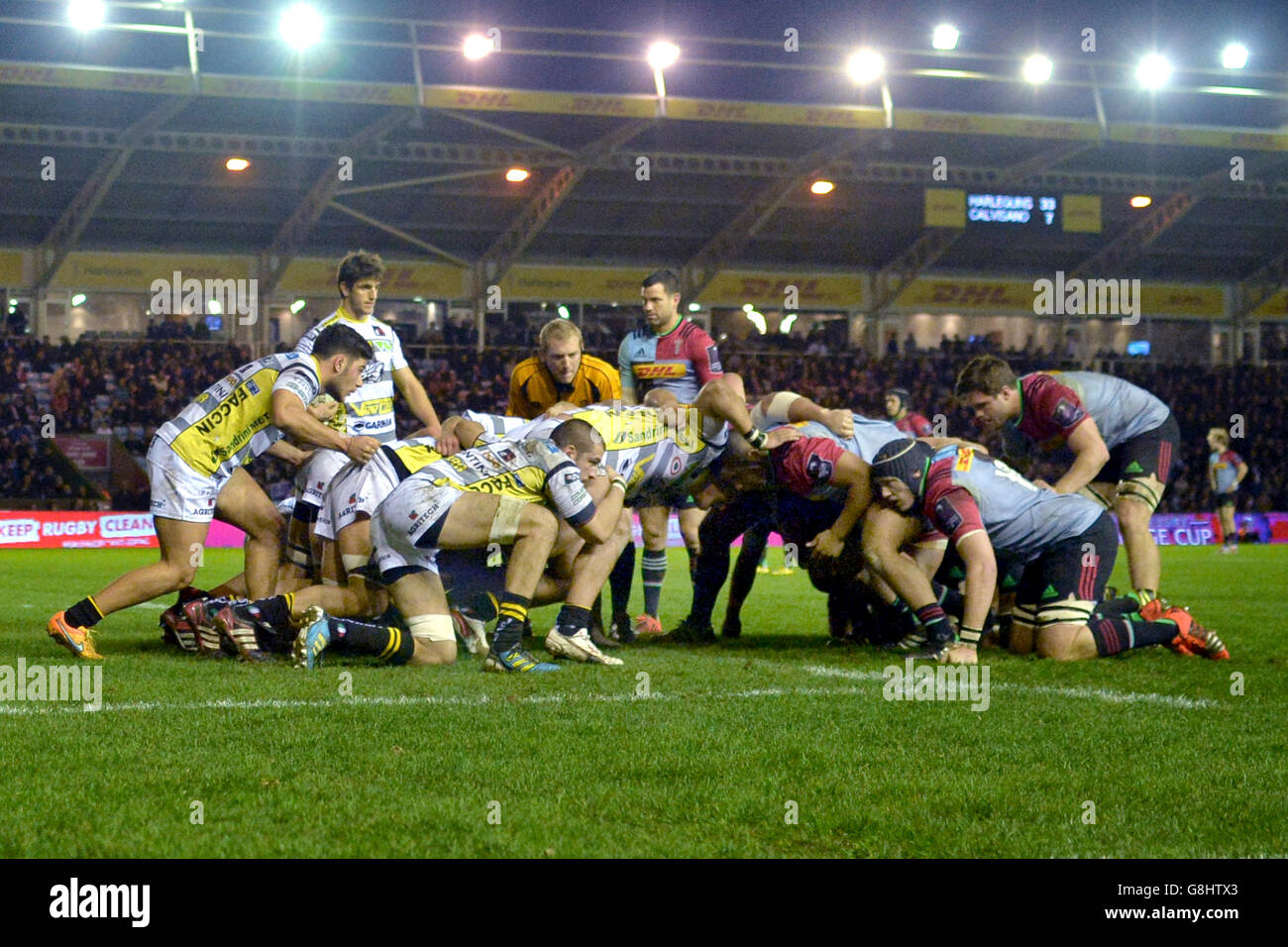 Both teams compete for a scrum during the European Challenge Cup match ...