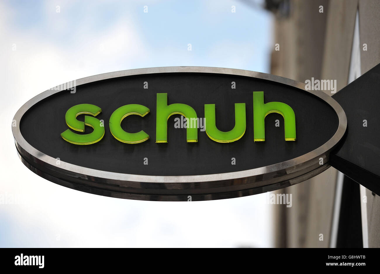 Shop sign stock. A shop sign for Schuh in central London Stock Photo ...