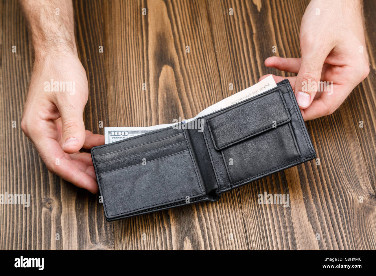 Hands holding white wallet hi-res stock photography and images - Alamy