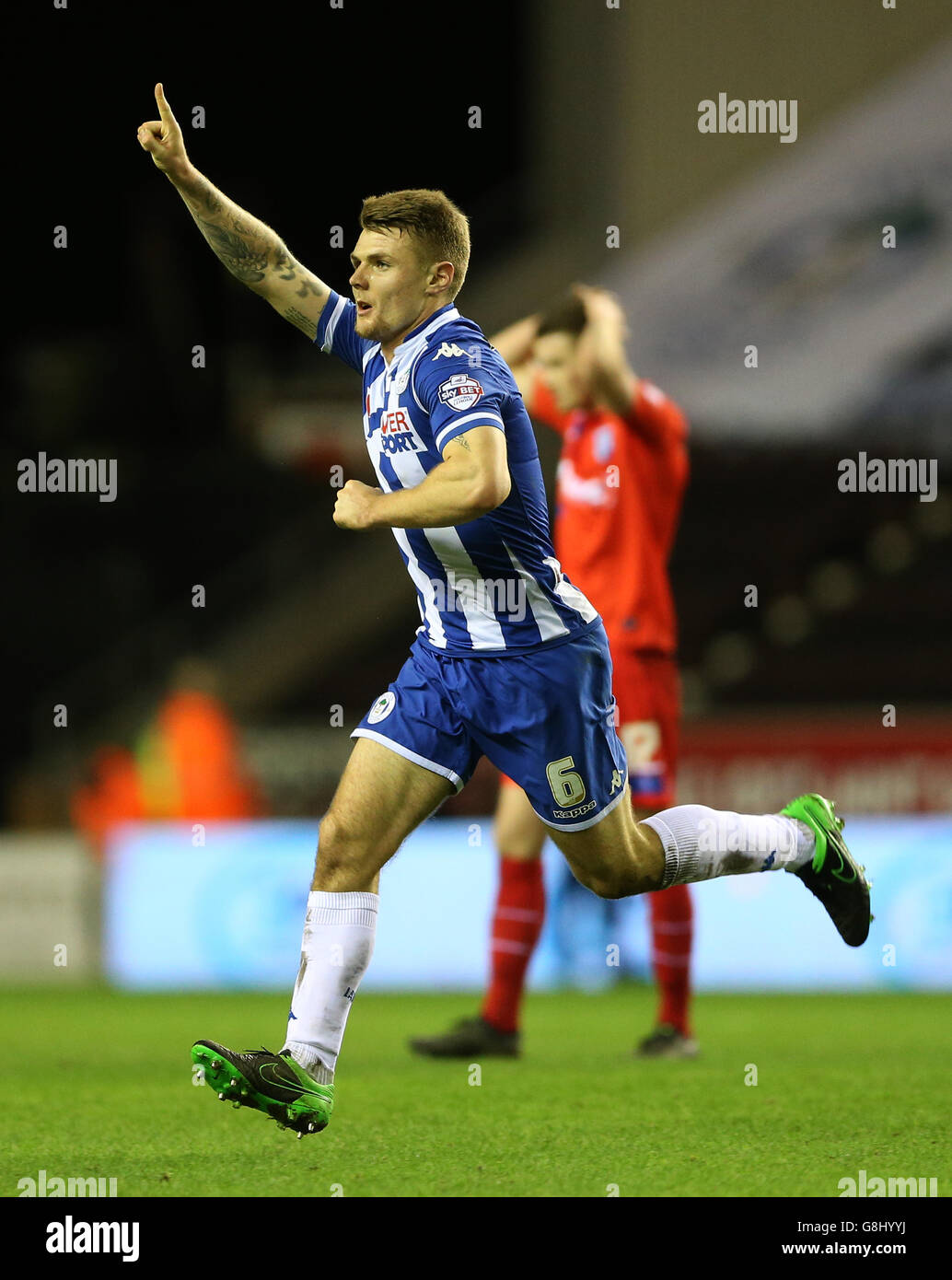 Wigan Athletic's Max Power celebrates scoring his side's second goal of ...