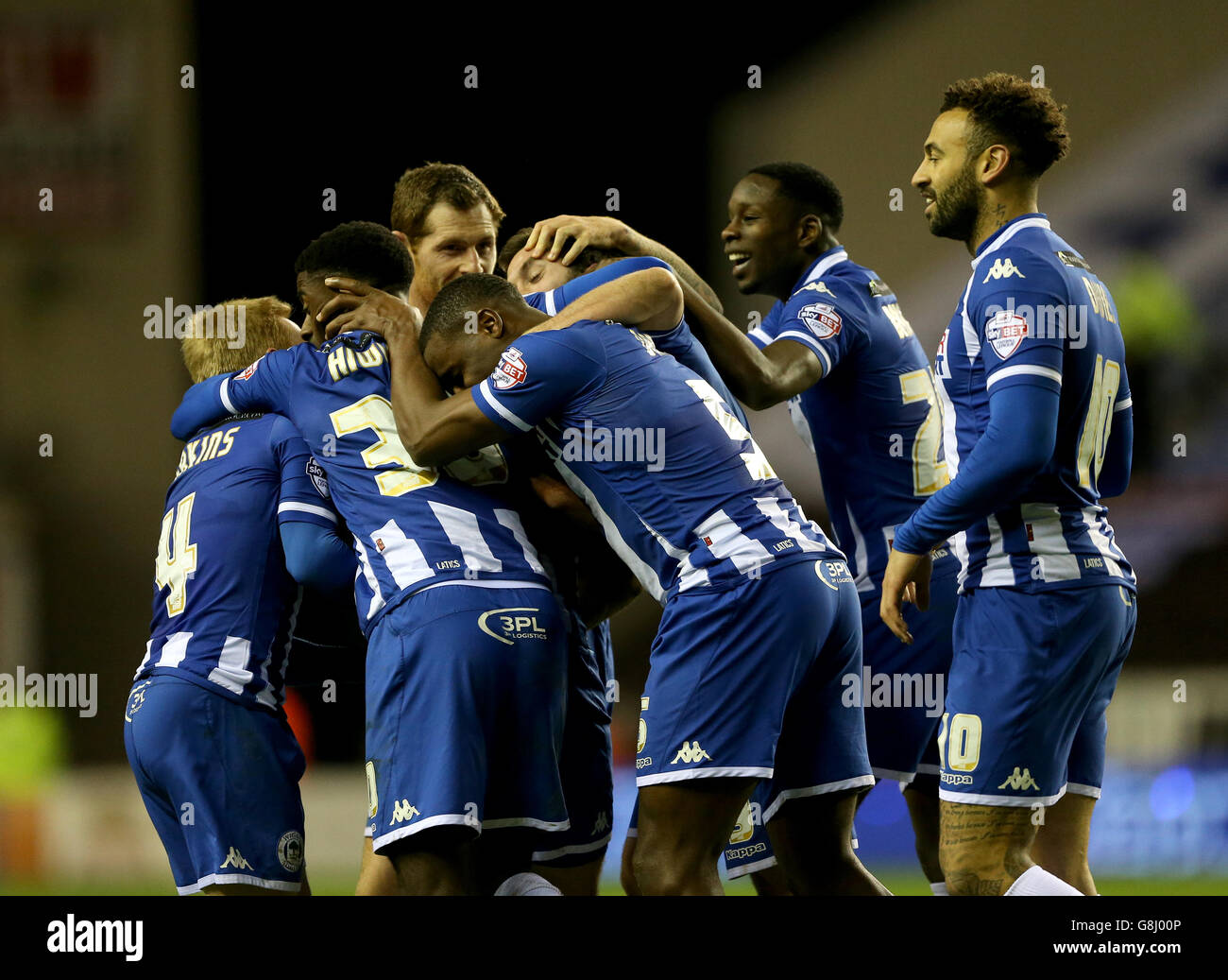 Wigan Athletic's Craig Morgan (centre) celebrates scoring his side's ...