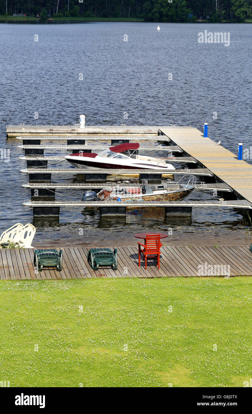 Beautiful Russian Volga river with a jetty for boats Stock Photo - Alamy