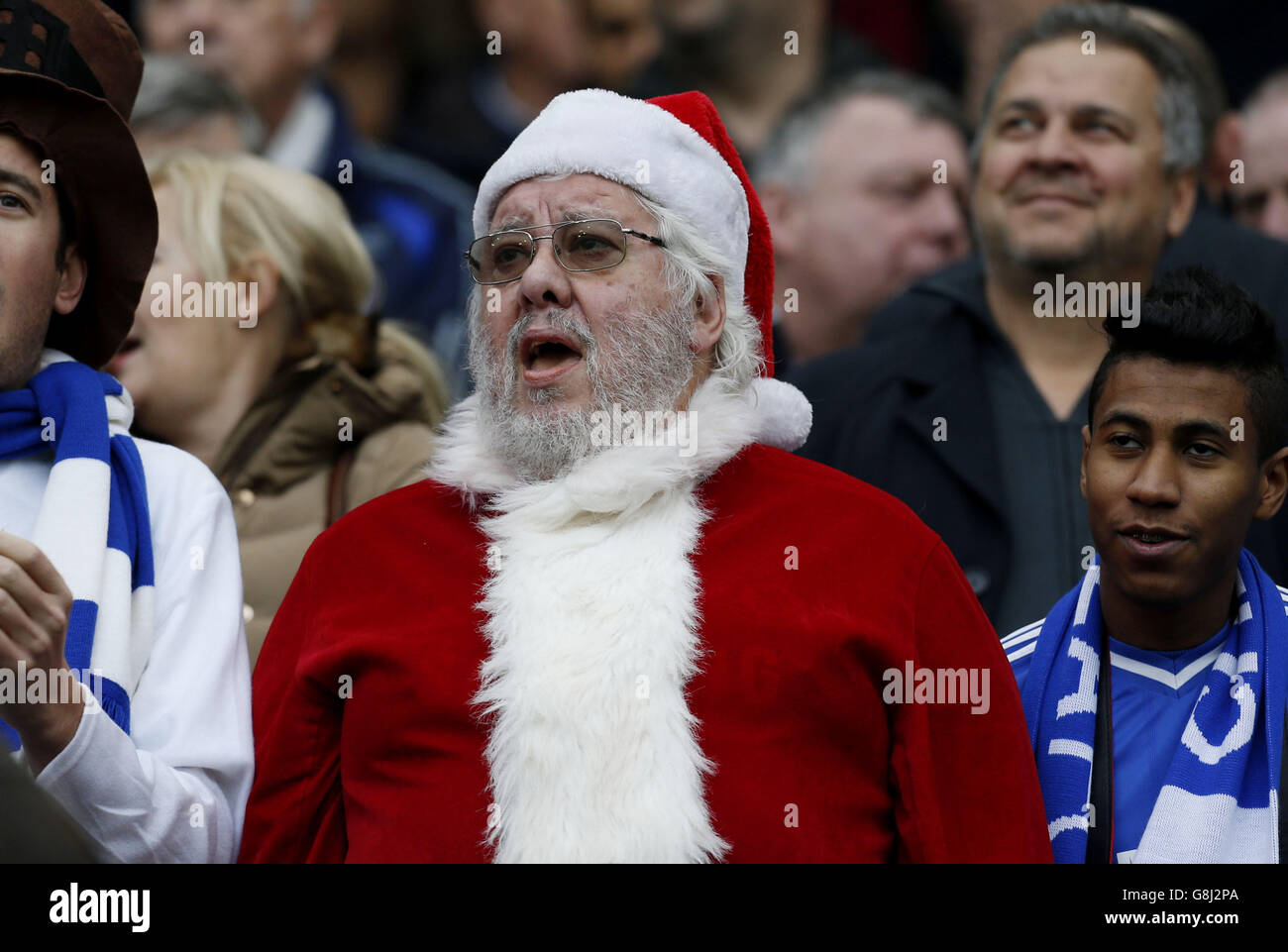 A Chelsea fan dressed as Father Christmas before the Barclays Premier ...