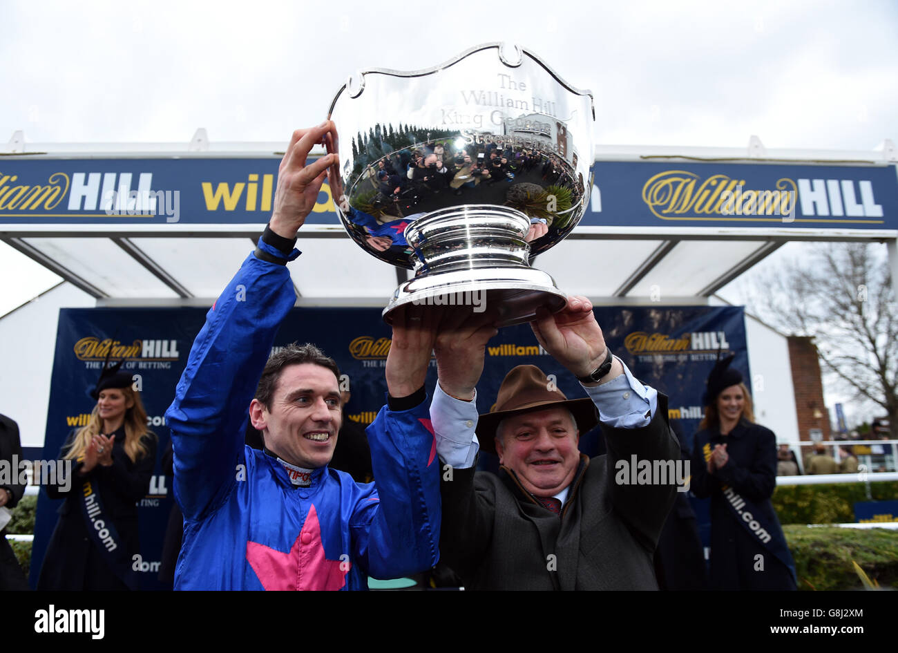 Jockey Paddy Brennan (left) and trainer Colin Tizzard celebrate with ...