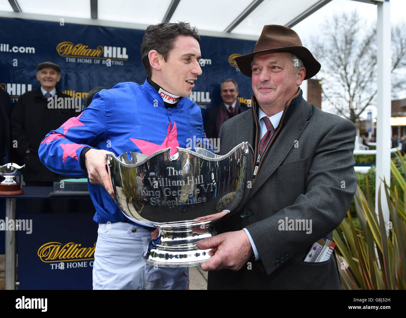 Jockey Paddy Brennan (left) and trainer Colin Tizzard celebrate with ...