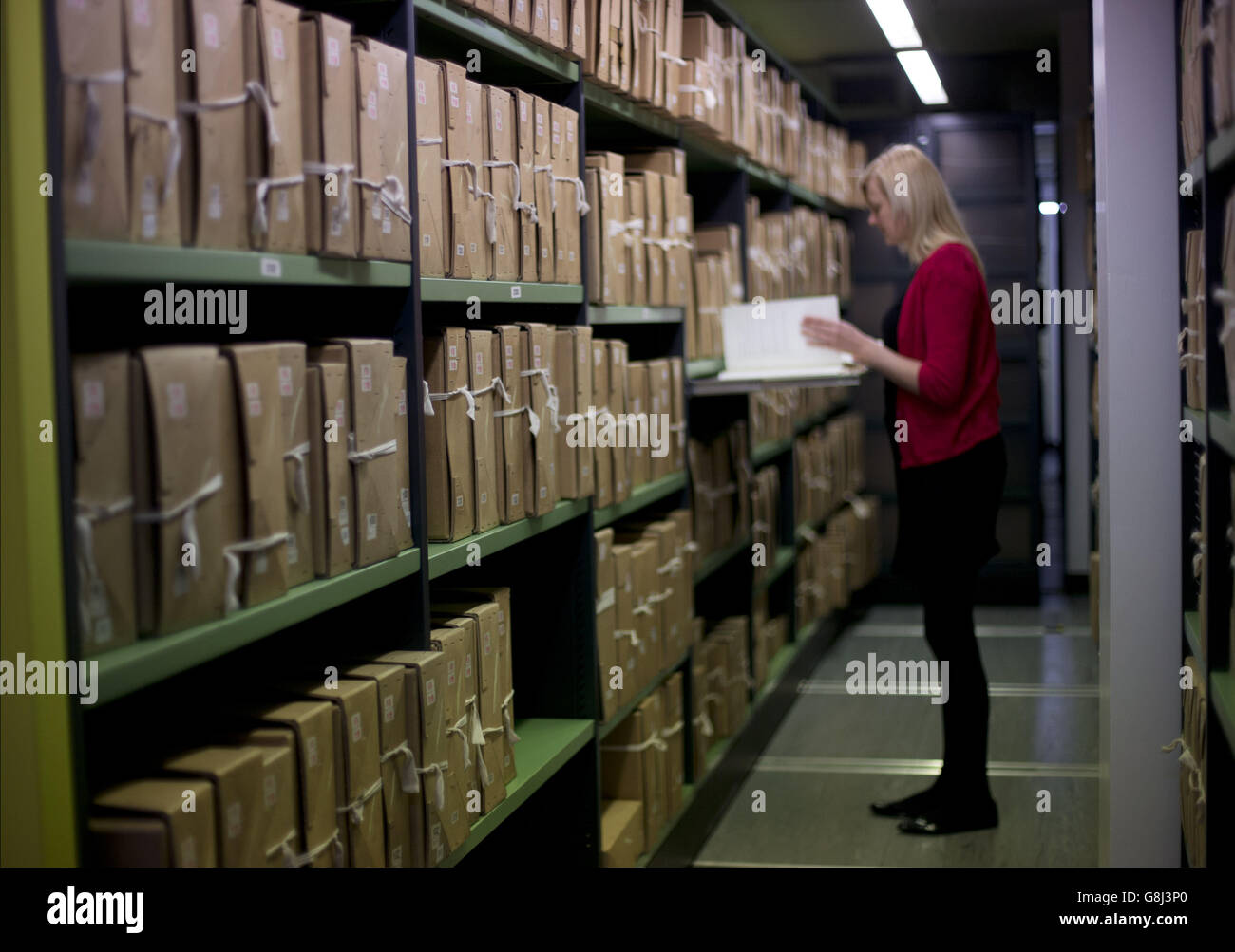 22/12/15 A member of staff in the repositories of the National Archives ...