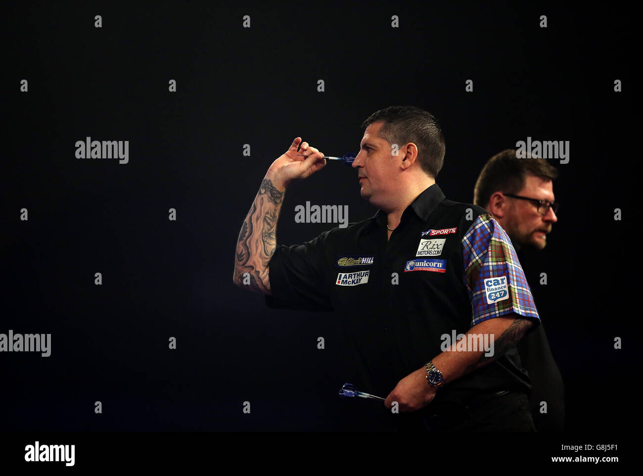 Garry Anderson and James Wade in action during the Quarter Final match ...