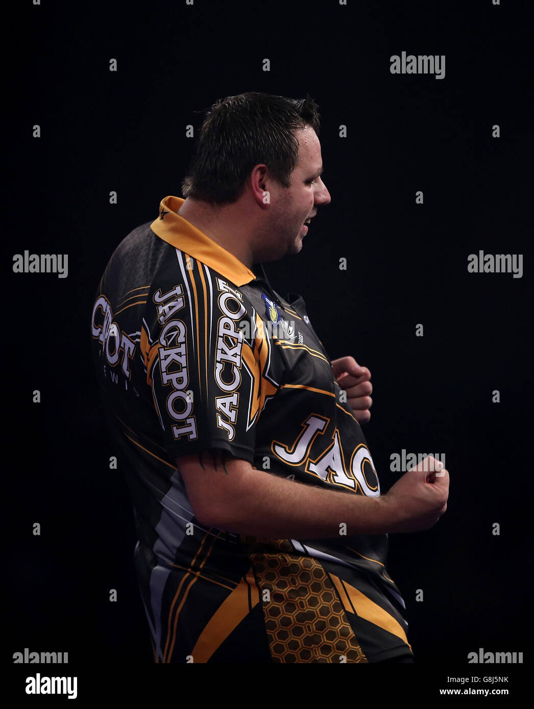 Adrian Lewis celebrates winning his Quarter Finals match during day ...