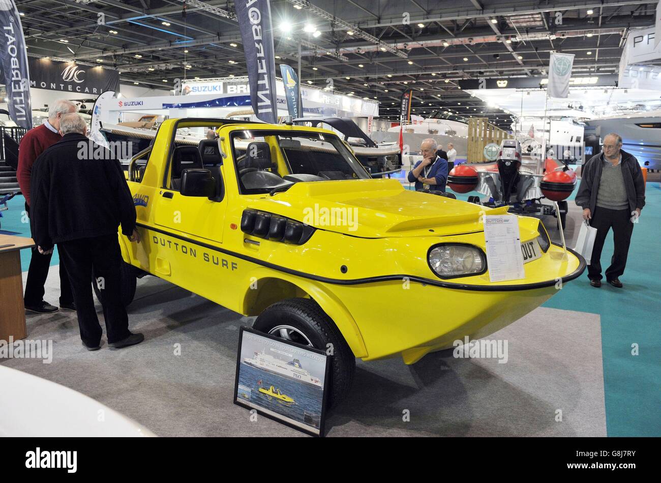 People stop to view a Dutton Surf amphibious car during the preview day ...