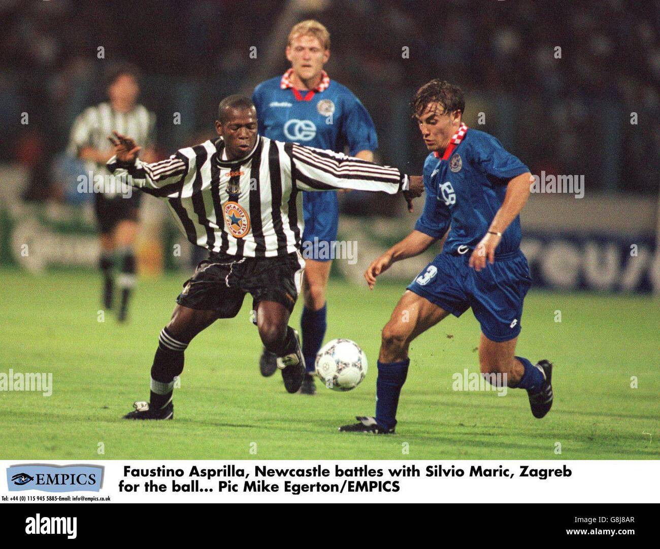 Faustino Asprilla of Newcastle (left) battles for the ball with Silvio ...