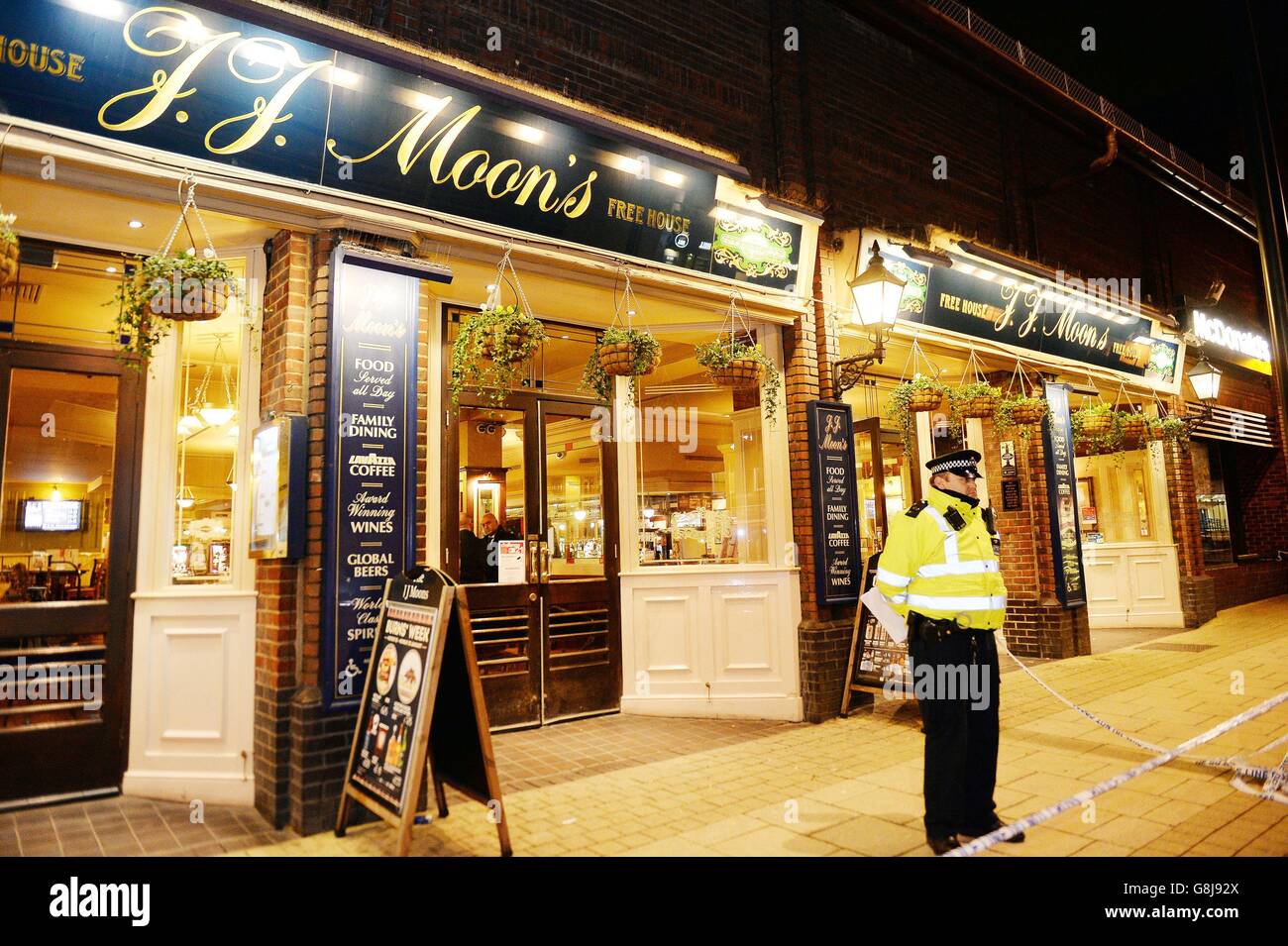 Police outside the j j moons pub in hornchurch essex hi-res stock ...