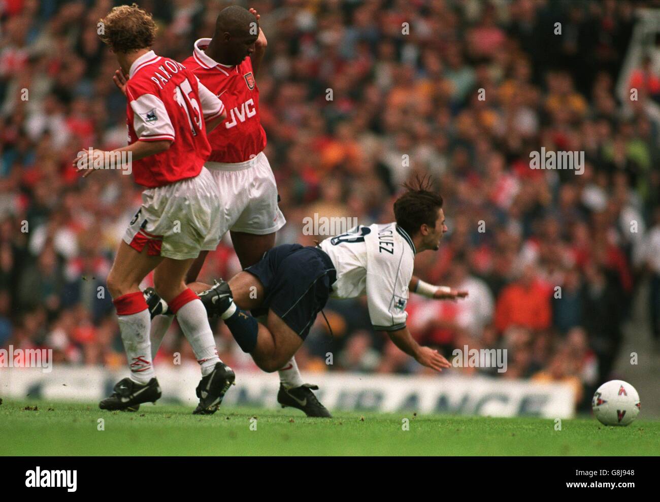 Arsenal's Ray Parlour (left) and Patrick Vieira (right) combine to foul ...