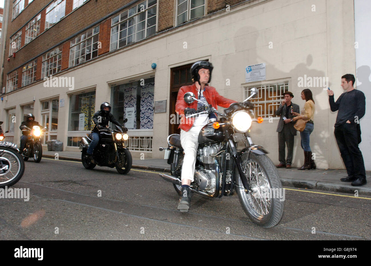Graham Coxon arrives on his Triumph Bonneville T100 motorcycle at the ...