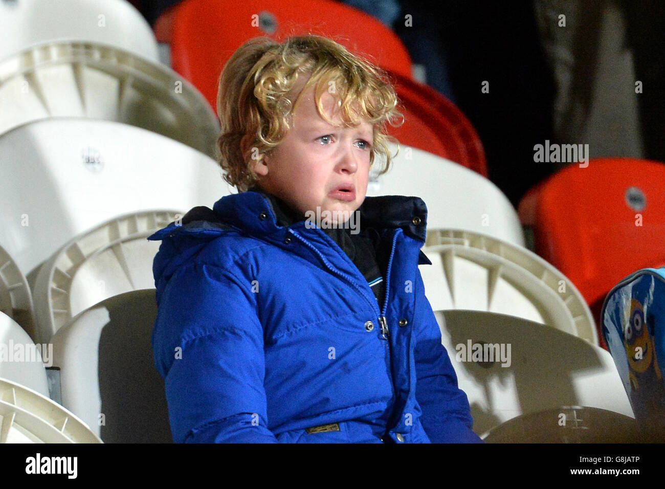 Young fan in tears in the at the keepmoat stadium hi-res stock ...