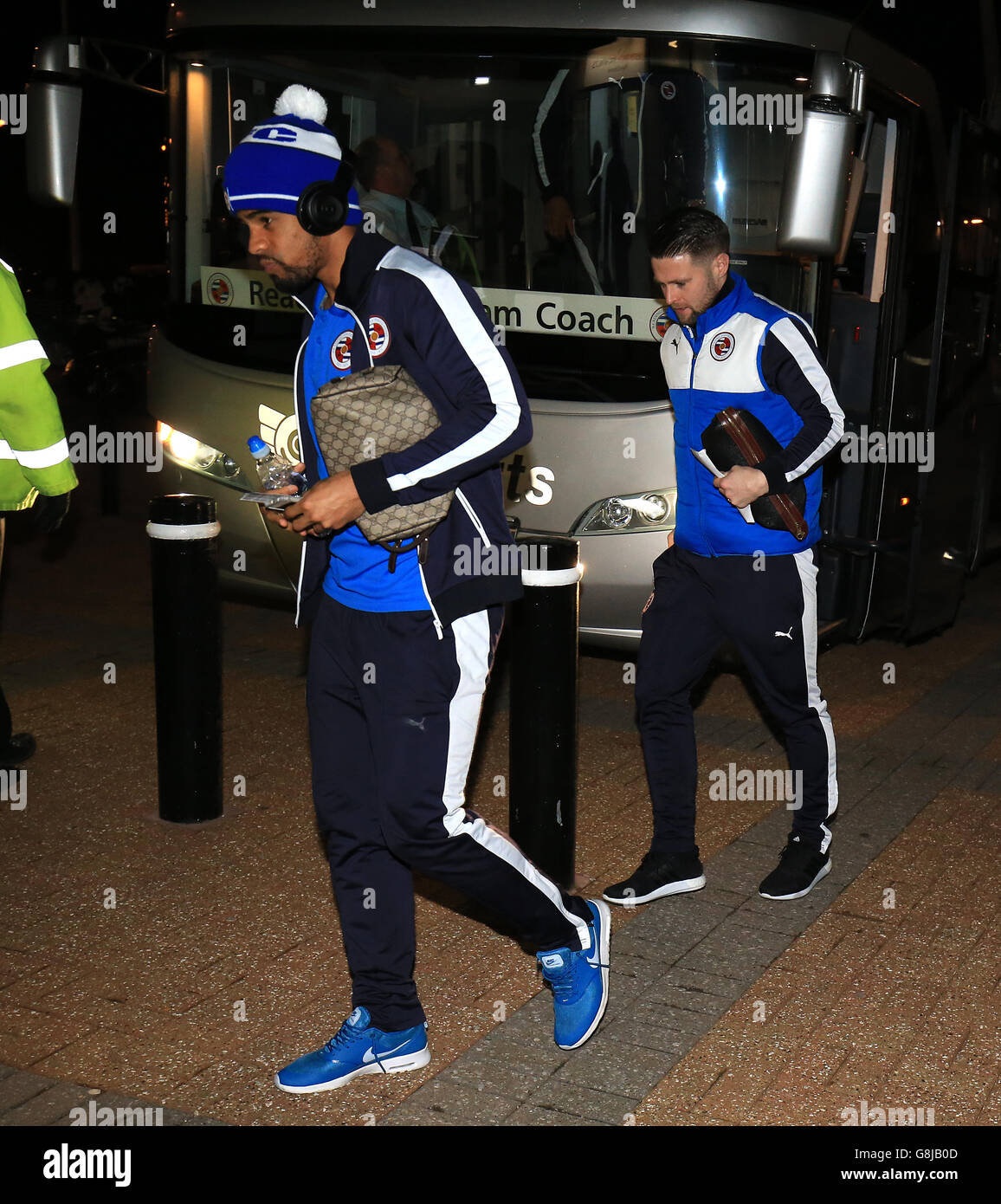 Reading's Garath McCleary (left) and Oliver Norwood get off the team ...