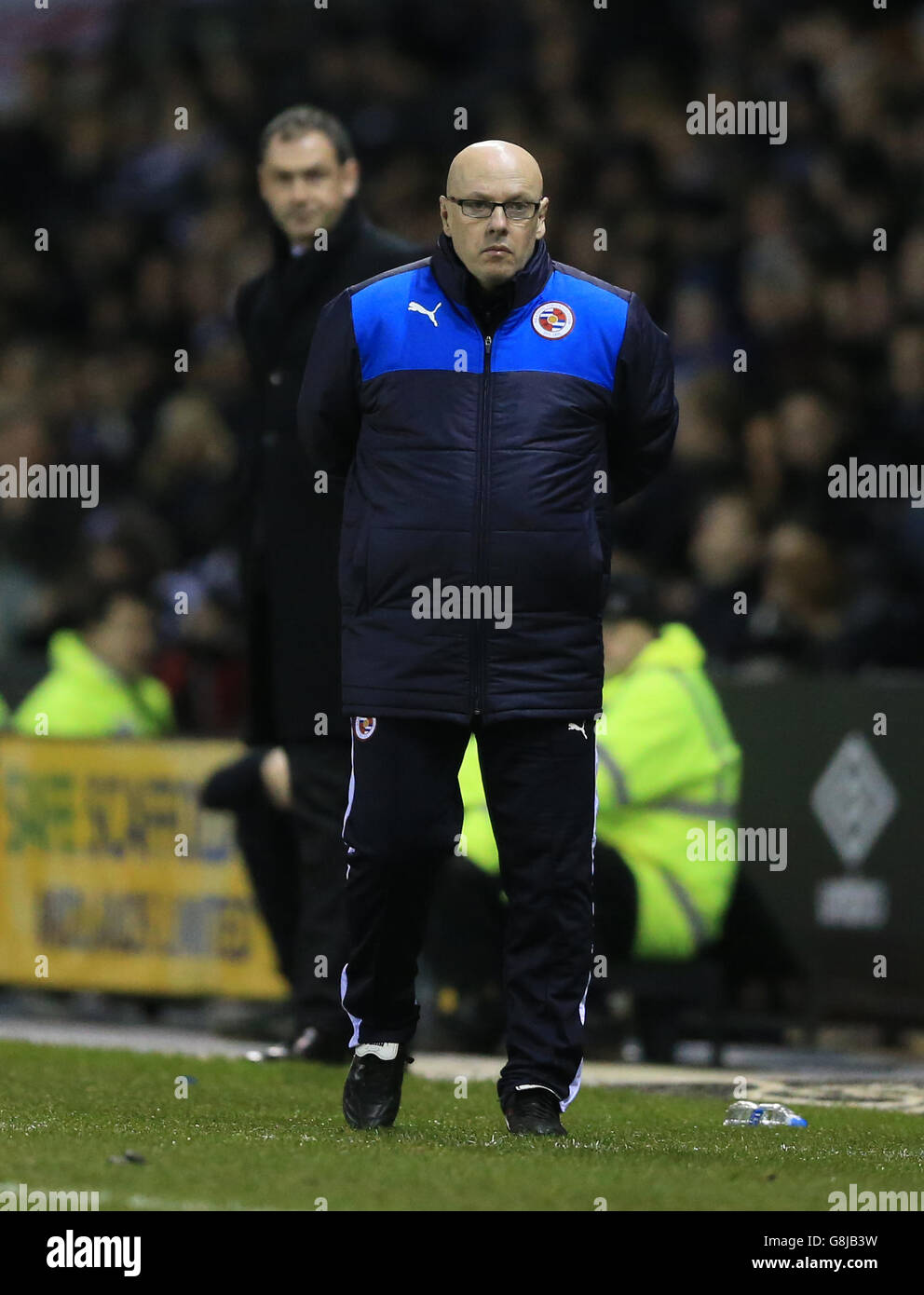 Reading manager Brian McDermott (front) and Derby County manager Paul ...