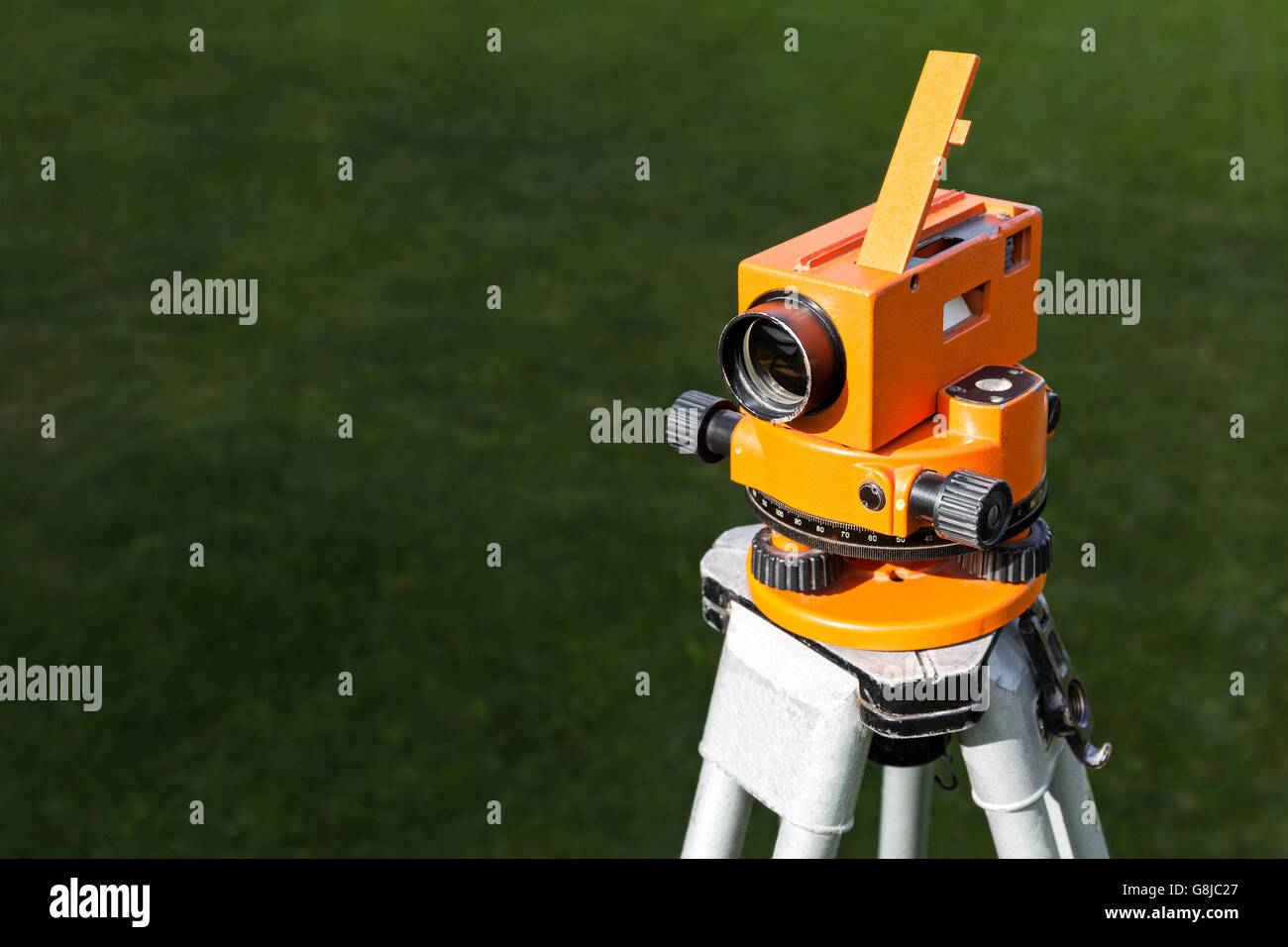 Construction equipment theodolite tool at construction site in summer ...