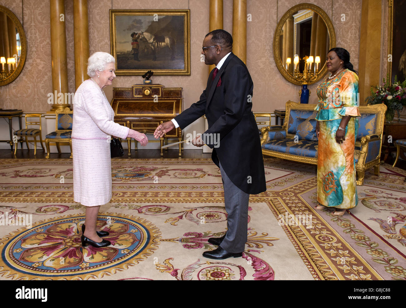 High Commissioner of Zambia Muyeba Shichapwa Chikonde presents his ...