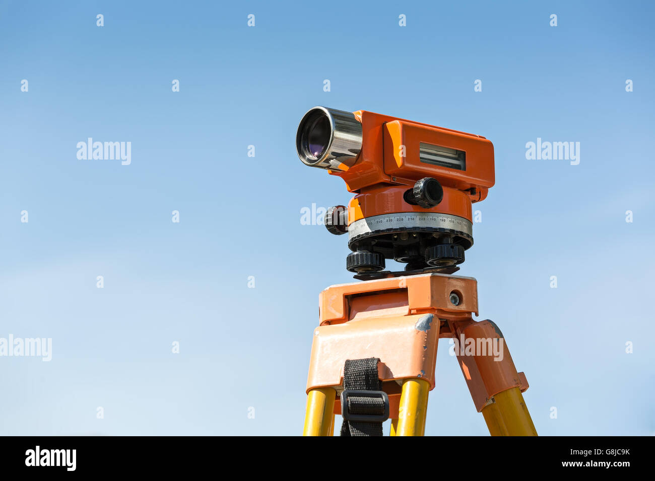 construction equipment theodolite level tool against blue sky Stock ...