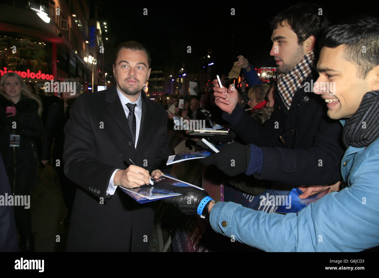Leonardo DiCaprio signs autographs as he arrives for The Revenant ...