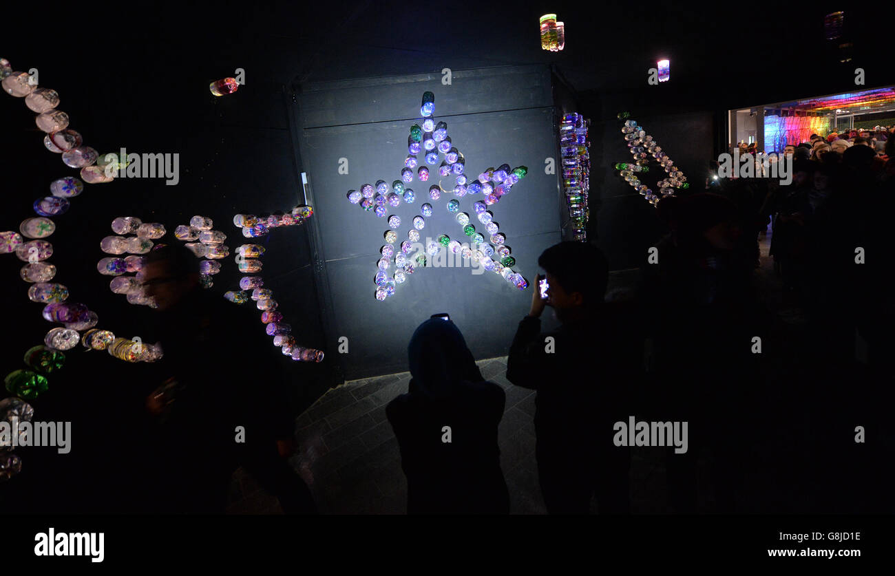 Members of the public view Litre of Light by Mick Stephenson at The ...