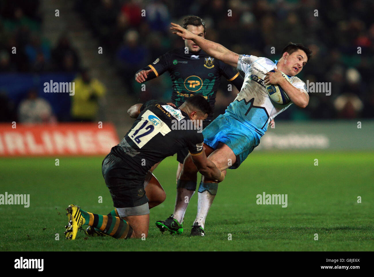 Glasgow Warriors Sam Johnson is tackled by Northampton Saints Luther ...