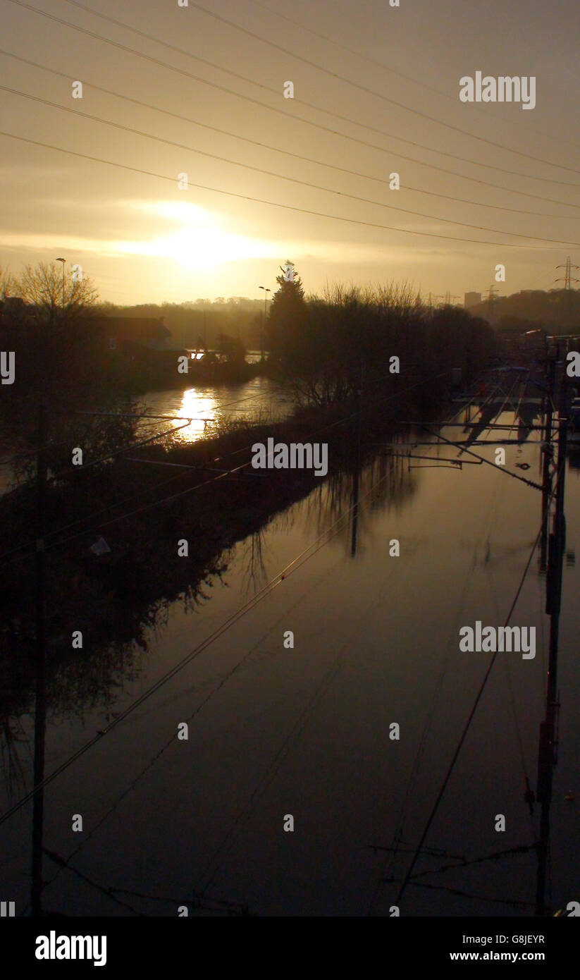 A flooded railway line at Kirkstall, Leeds, as swamped towns and cities ...