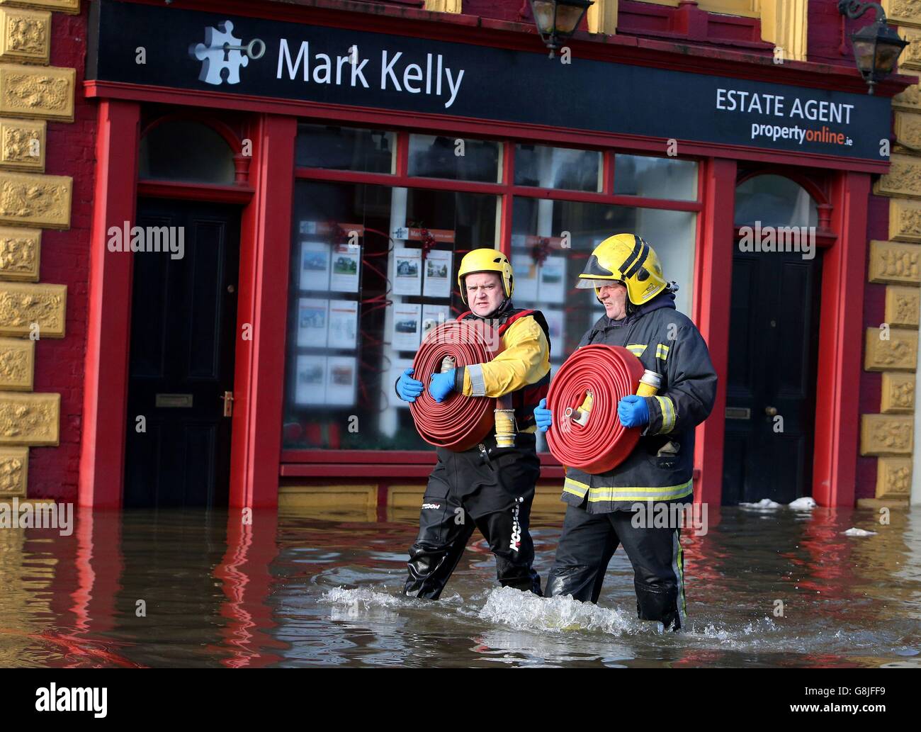 Members of the fire service work as flooding continues in hi-res stock ...