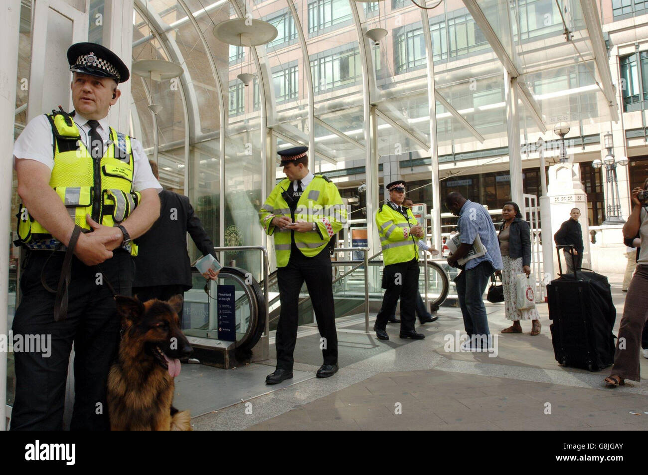 British Transport Police stand guard at Liverpool Street station, after ...
