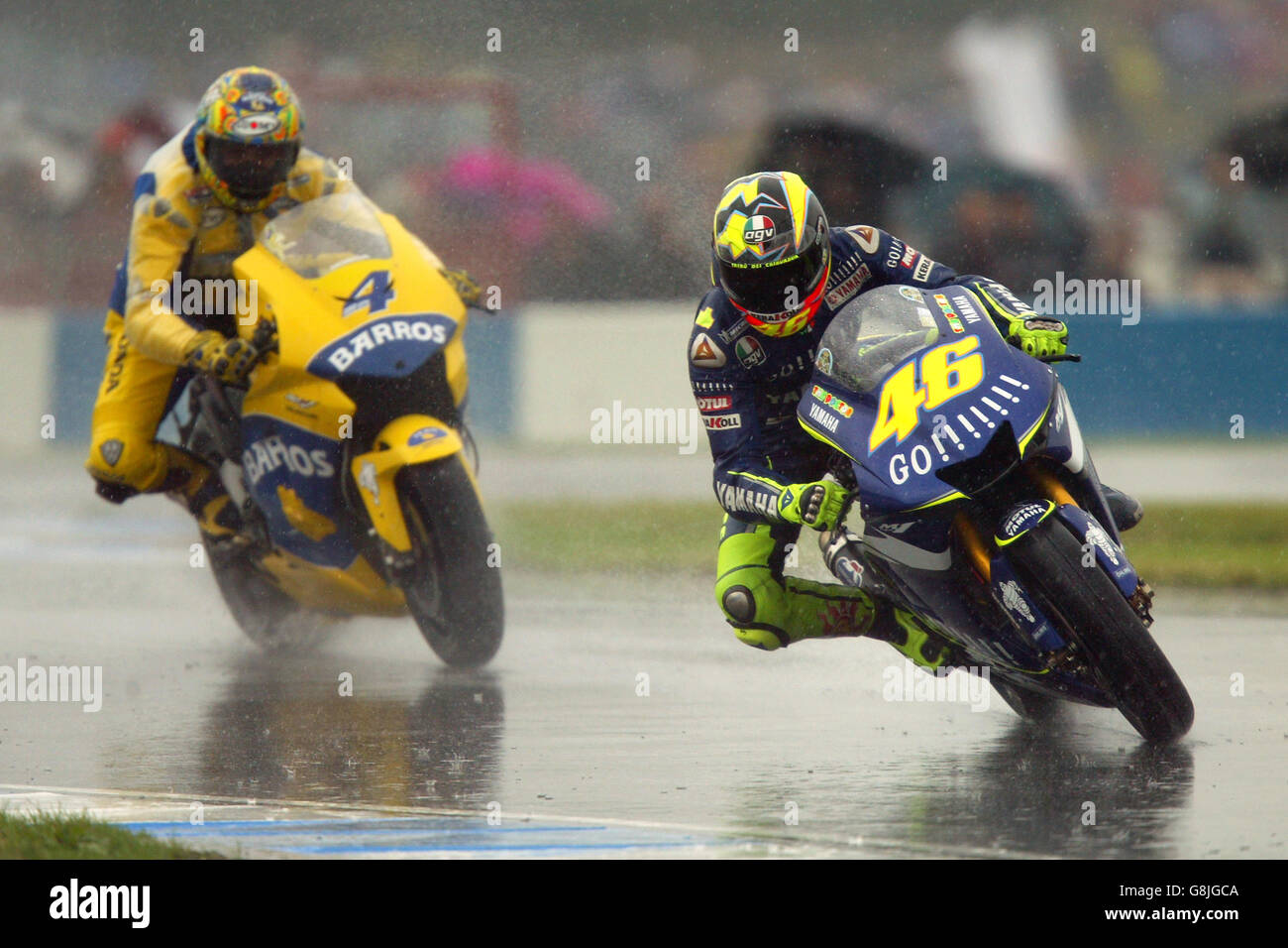 Gauloises Yamaha Team's Valentino Rossi (r) leads from Camel Honda's ...
