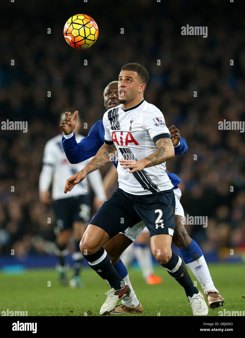 Tottenham Hotspur's Kyle Walker (front) and Everton's Arouna Kone in ...