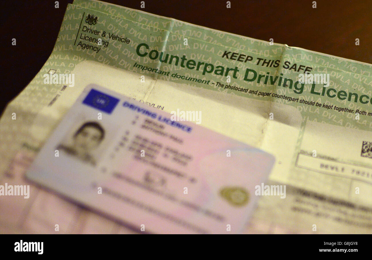 A UK driving licence shown beside a counterpart driving licence, London ...