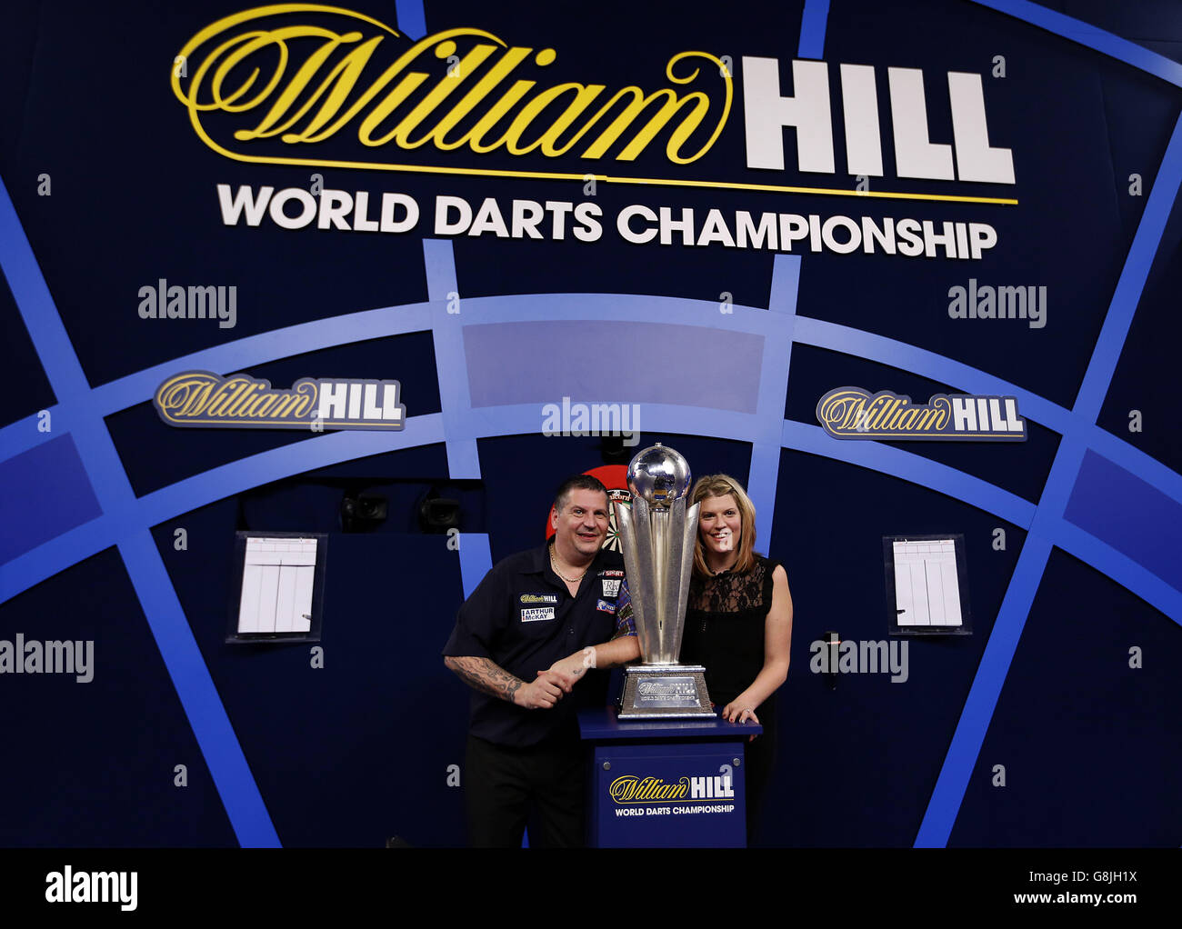 Gary Anderson celebrates with his partner Rachel Ford with the Sid ...